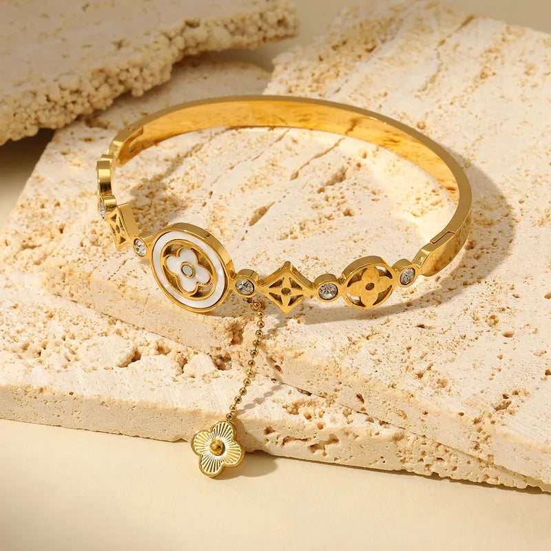 Florence Four-Leaf Clover Gold Bangle Bracelet – Sparkle & Blue Wholesale